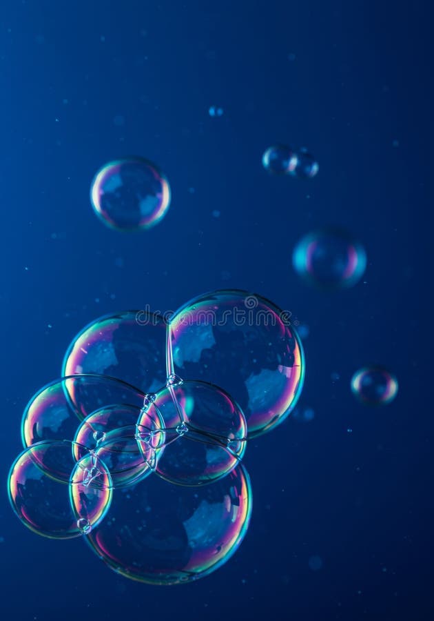 Floating Iridescent Bubbles on Blue Background Stock Illustration ...