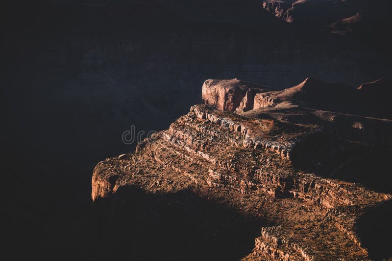 Floating Island of Rock in a Sea of Shadow Stock Image - Image of ...