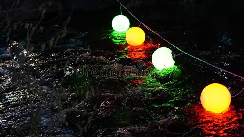 Floating Light Balls on the River Stream Stock Photo - Image of leaf ...