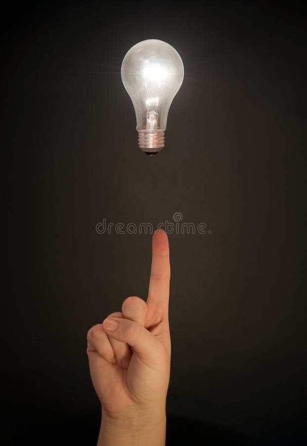 Floating Light Bulb and Hand Stock Image - Image of brightly, abstract ...
