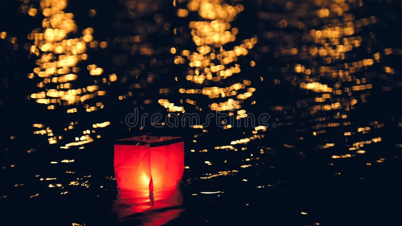 Floating Lighting Water Lanterns on River at Night Stock Image - Image ...