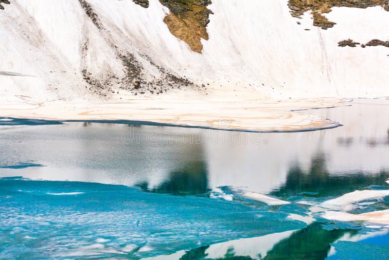 Floating Melting Ice at the Mountain Lake Stock Image - Image of ...