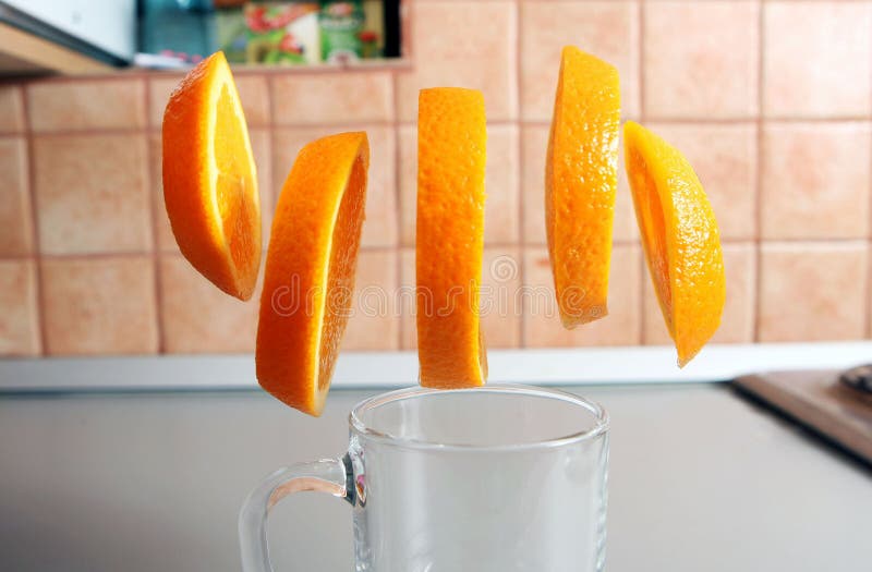 Floating orange stock photo. Image of juicy, kitchen - 38438448