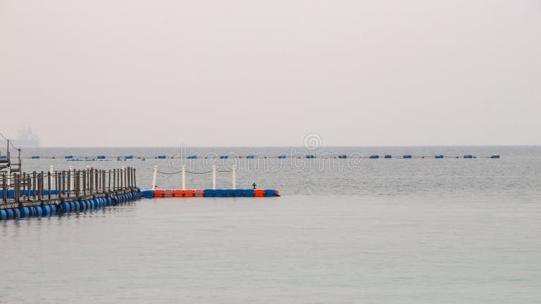 Floating Pier or Bridge Structure Over the Beach Stock Image - Image of ...