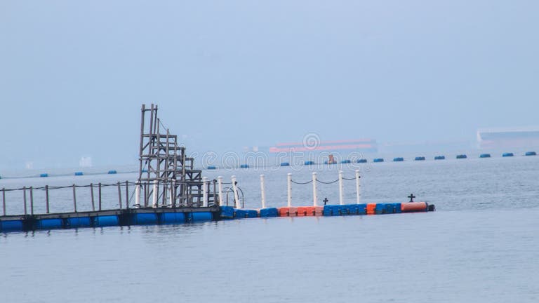 Floating Pier or Bridge Structure Over the Beach Stock Photo - Image of ...