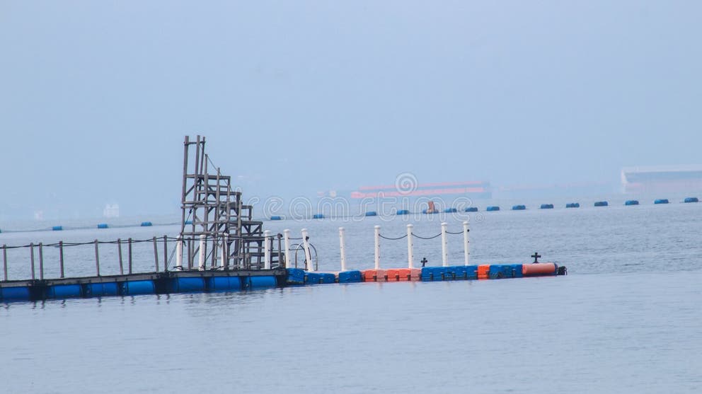Floating Pier or Bridge Structure Over the Beach Stock Photo - Image of ...