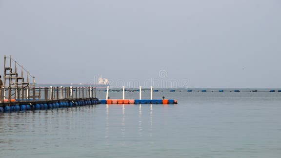 Floating Pier or Bridge Structure Over the Beach Stock Photo - Image of ...