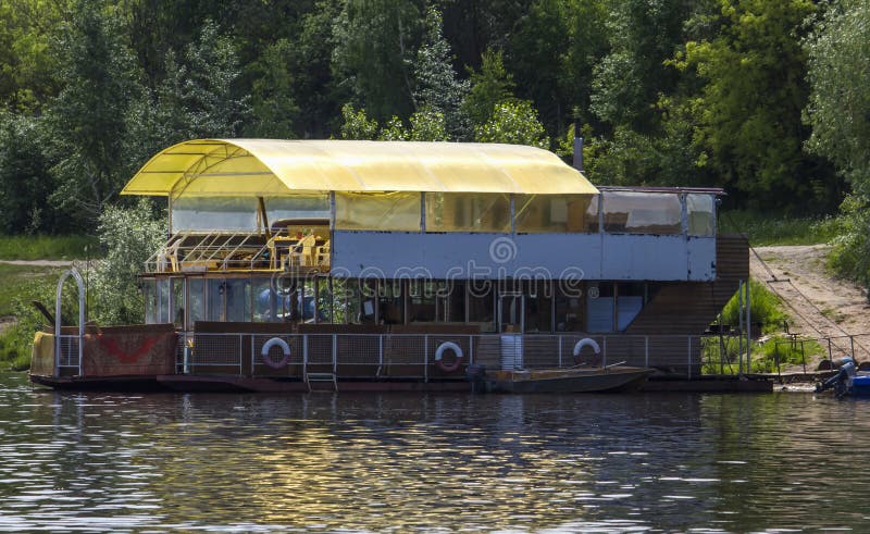 Floating Pier Inhabited by People on the River Stock Image - Image of ...