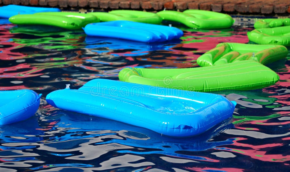 Floating plastic boards stock photo. Image of relaxing - 19850196