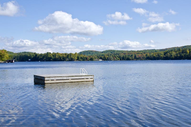 Floating Platform on a Lake #2 Stock Photo - Image of cottages, board ...