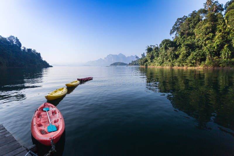 Floating Red and Yellow Canoe or Kayak in Dam Stock Photo - Image of ...