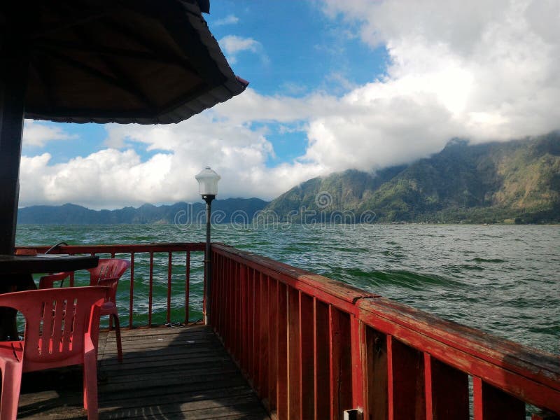 Floating Restaurant in the Middle of Lake and Mountain Stock Image ...