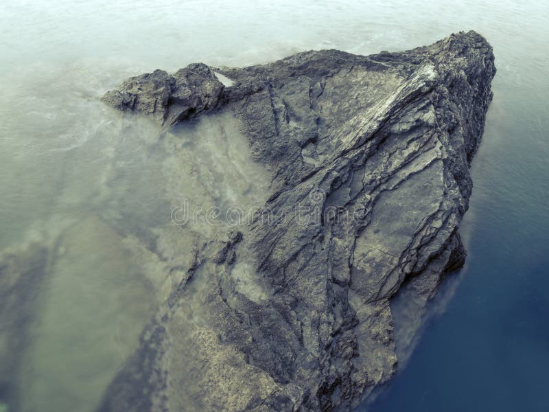 Sea rock formation stock photo. Image of single, wave - 157025792