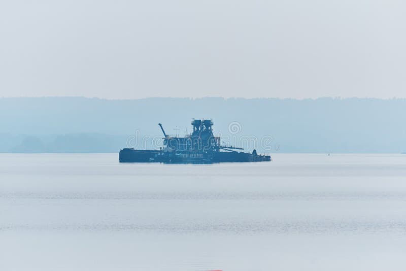 Floating Sand Mining Plant on the River in the Morning Fog Stock Photo ...