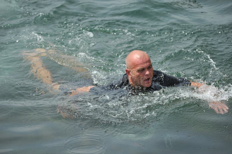 Man Floating in a Glassy Water of Dead Sea Stock Image - Image of enjoy ...