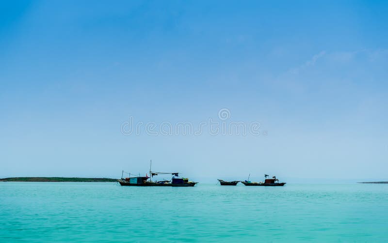 Small ship on the ocean stock photo. Image of blue, ocean - 156751910