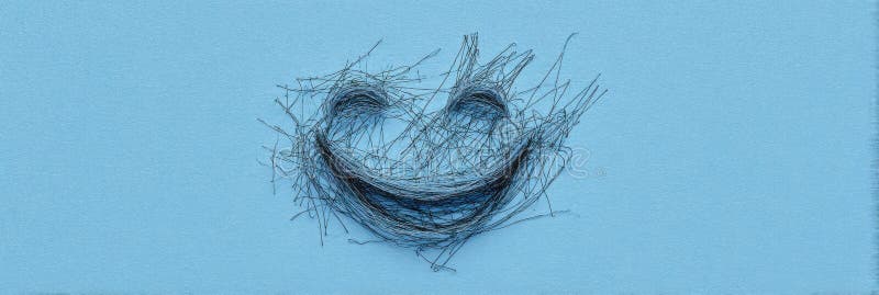 Floating Threads Form a Smiling Face Against a Blue Background ...