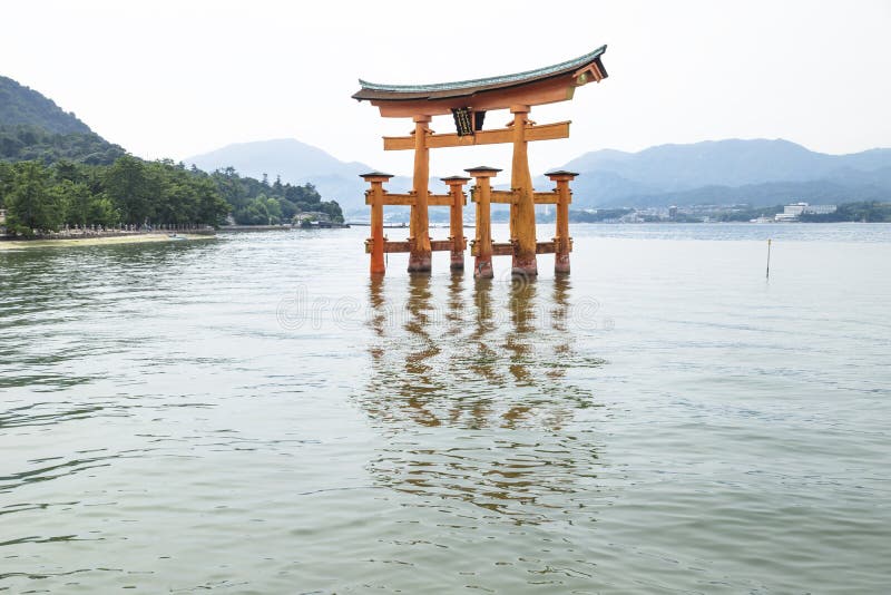 The Floating Torii Gate with Reflection in the Water in Miyajima, Japan ...