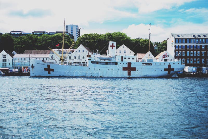 Floating White Ship with Red Crosses on the Bay in Trondheim, Norway ...
