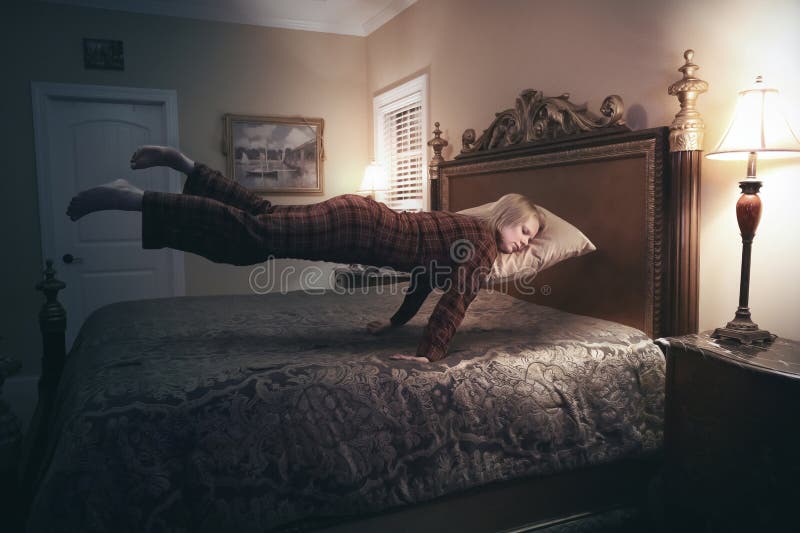Woman Floating Above Bed Stock Photos - Free & Royalty-Free Stock ...