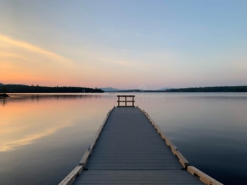 Floating Wooden Bridge on Lake during Sunset Stock Photo - Image of ...
