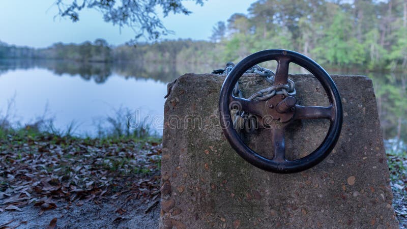 Flood Gate Control Valve for a Man Made Lake at Dusk Stock Image ...