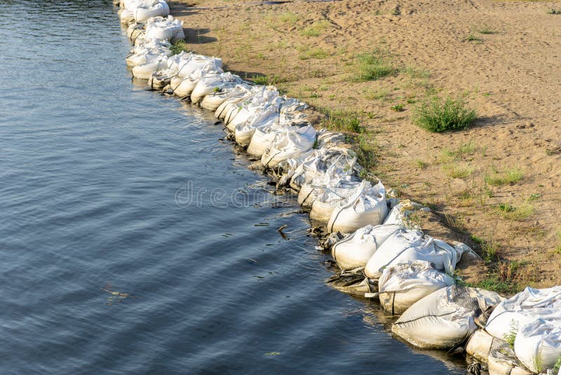 Flood Protection or Prevention at the Shore of a River Stock Photo ...