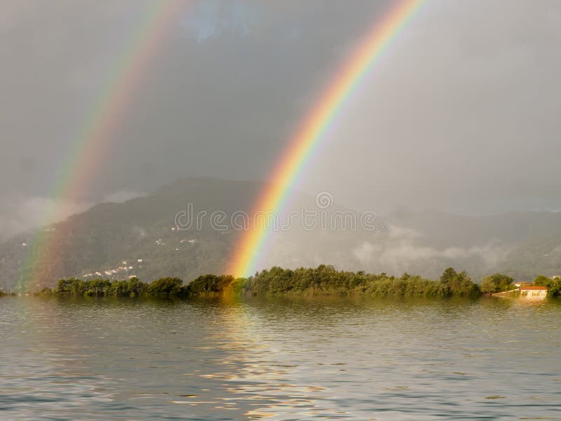Flood and Rainbow in the Countryside with Hills Stock Image - Image of ...