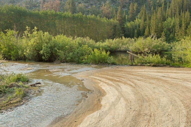 Flooded Dirt Road stock photo. Image of flooded, gravel - 109943824