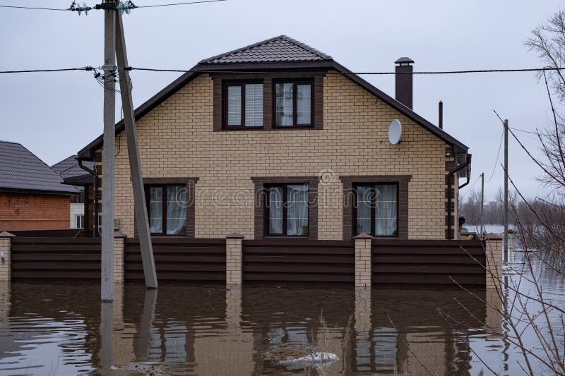 Flooded House. House Was Flooded with Water during Spring Flood. Stock ...