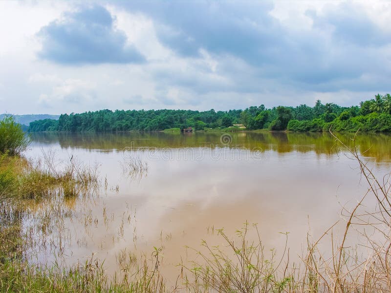 Flooded river stock image. Image of encroaching, river - 272625939