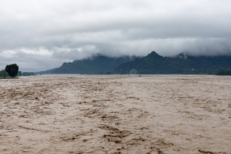 Flooded River Submerging the Valley after Heavy Rain Stock Photo ...