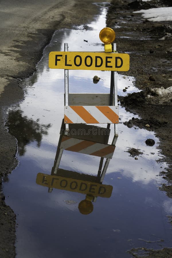 Flooded Sign Along Side of Road Stock Image - Image of hike, marked ...