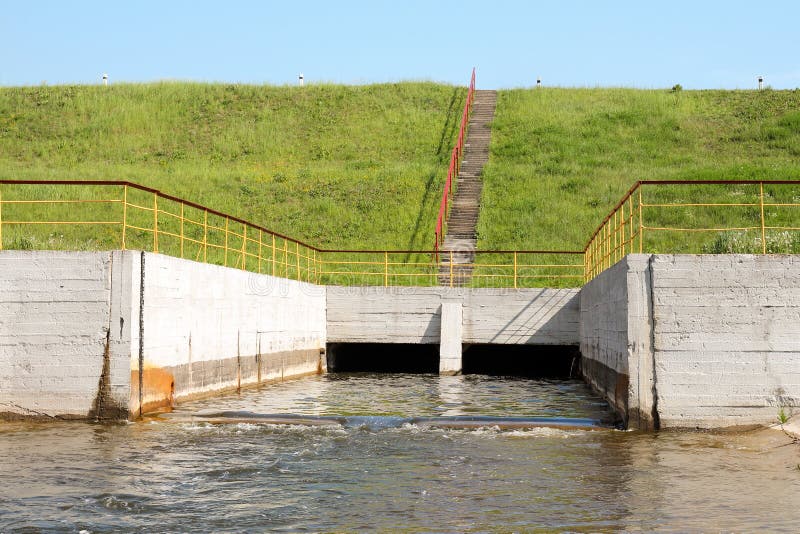 Floodgates of a small dam stock image. Image of hydroelectricity - 40892303