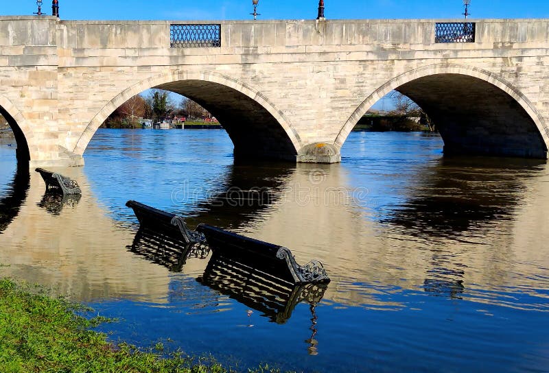 Flooding Around the Bridge Over the Thames. Stock Photo - Image of ...