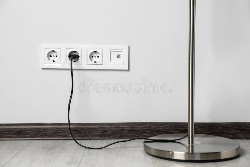 Floor Lamp Plugged into Wall Power Socket Indoors Stock Image - Image ...