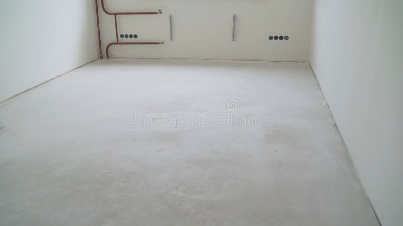Floor Leveling Works. Fresh Concrete Floor of a Construction Site Stock ...
