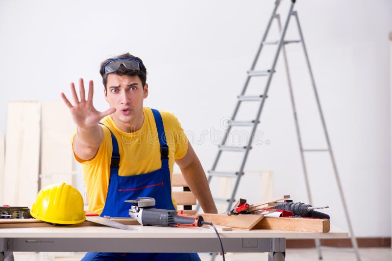 The Floor Repairman Disappointed with His Work Stock Image - Image of ...