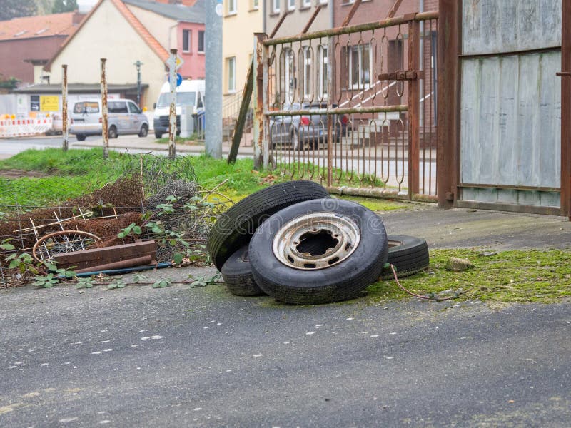 On a Floor are Some Old Car Wheels with Rusty Rims Stock Image - Image ...