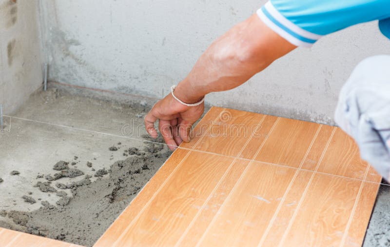 Floor tiles installation stock image. Image of glue, detail - 11162503