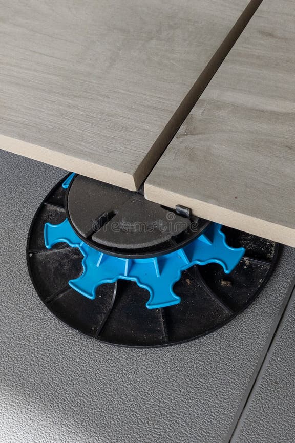 Floor Tile with Pedestal Support with Integrated Slope Plot Corrector ...