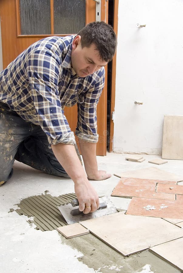 Floor tiles installation stock image. Image of modernise - 3511607