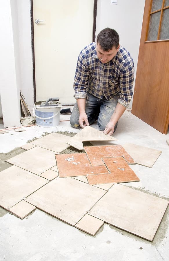 Floor tiles installation stock photo. Image of construction - 3511658