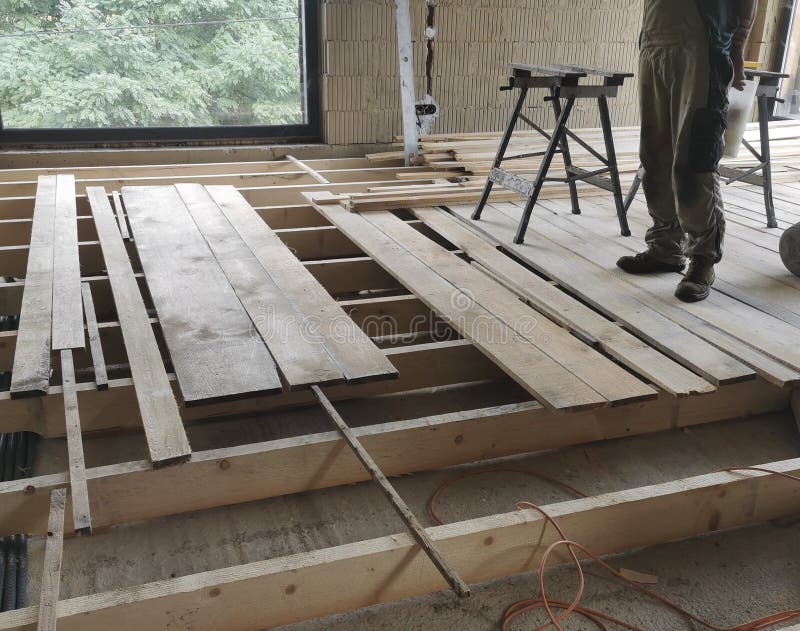Floorer Laying a Floor in a Building Stock Photo - Image of economy ...