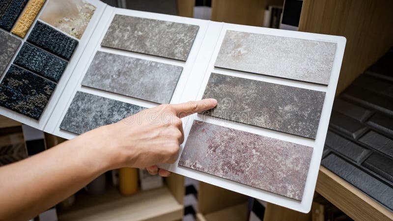 Flooring Material Design Collection. Designer Hand Pointing at Stone ...