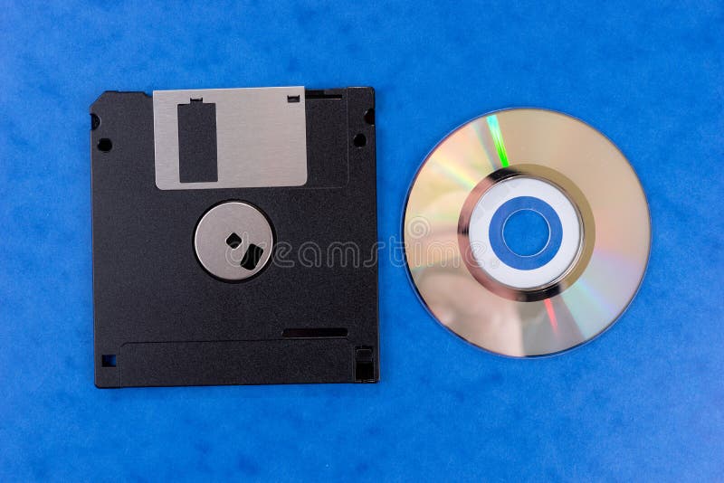 Floppy Disk and Classic Compact Disc on Blue Background Stock Photo ...