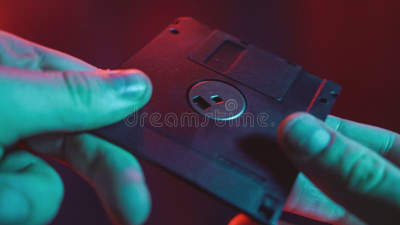 Floppy disk hand stock footage. Video of equipment, diskette - 232824956