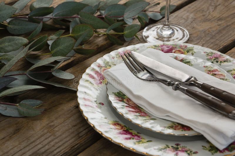 Floral Pattern Plate with Cutlery Set and Leaf Stock Image - Image of ...