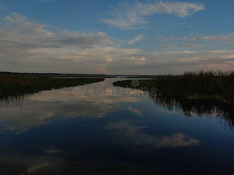 Florida Lake Blue Reflection Stock Image - Image of horizon, shore ...