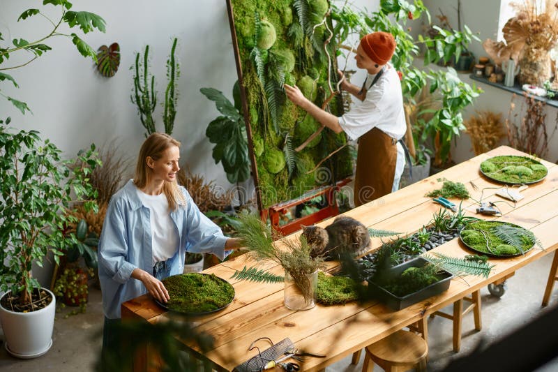 Florist and Decorator Making Handicraft Artwork from Plants Overhead ...